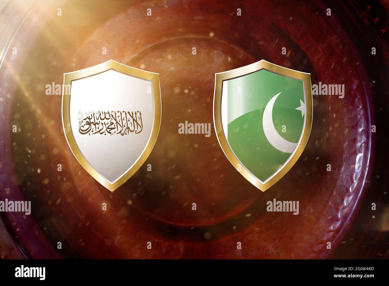 taliban and pakistan flag in golden shield on copper texture background ...