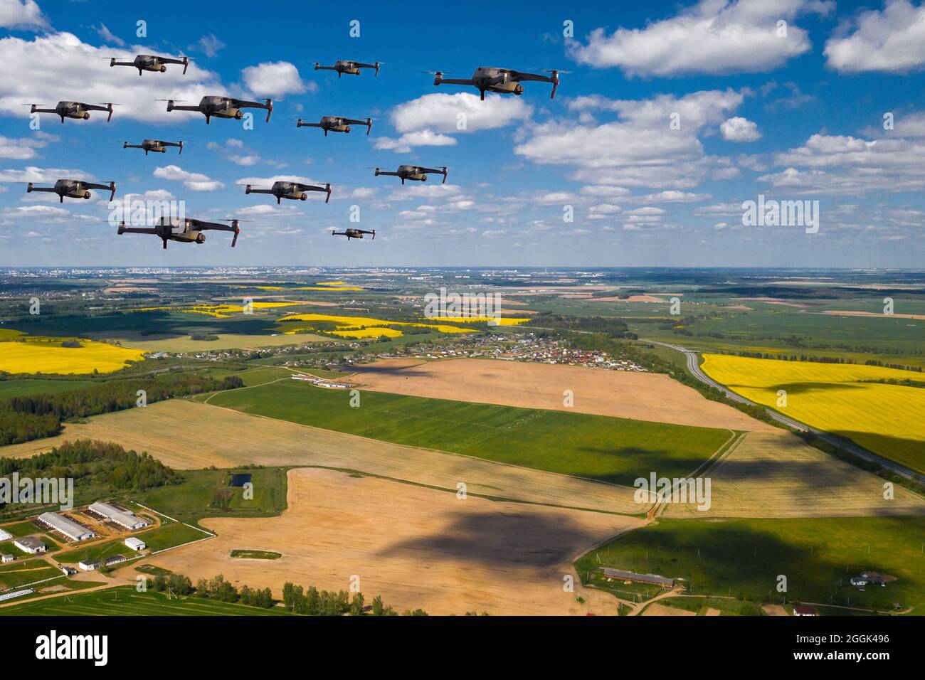 Drones fly over the fields. Natural landscape with drones and ...