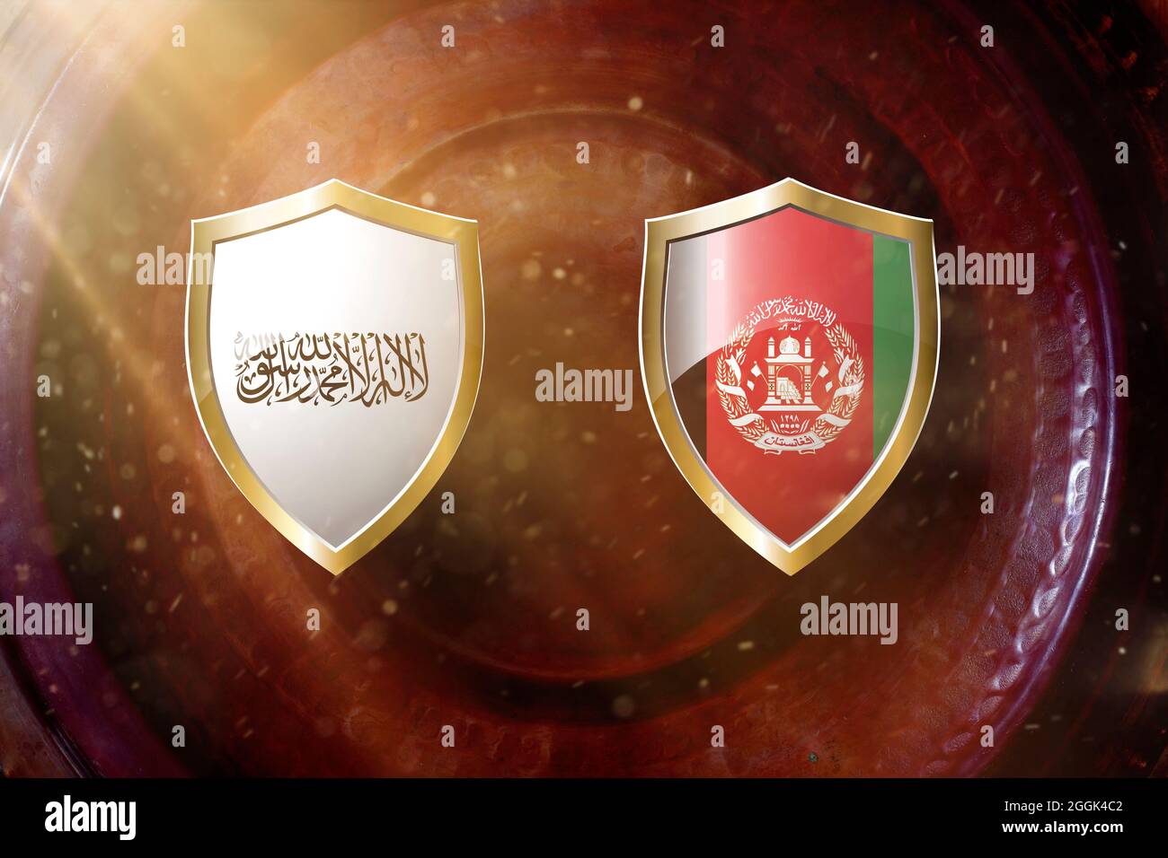 taliban and afghanistan flag in golden shield on copper texture ...