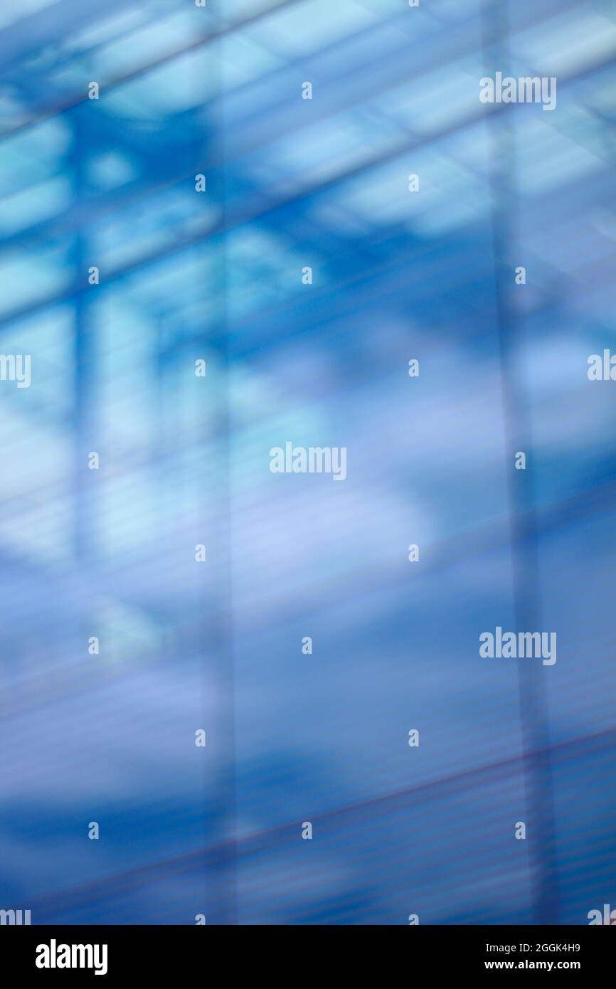 Glass facade with blue tint Stock Photo - Alamy