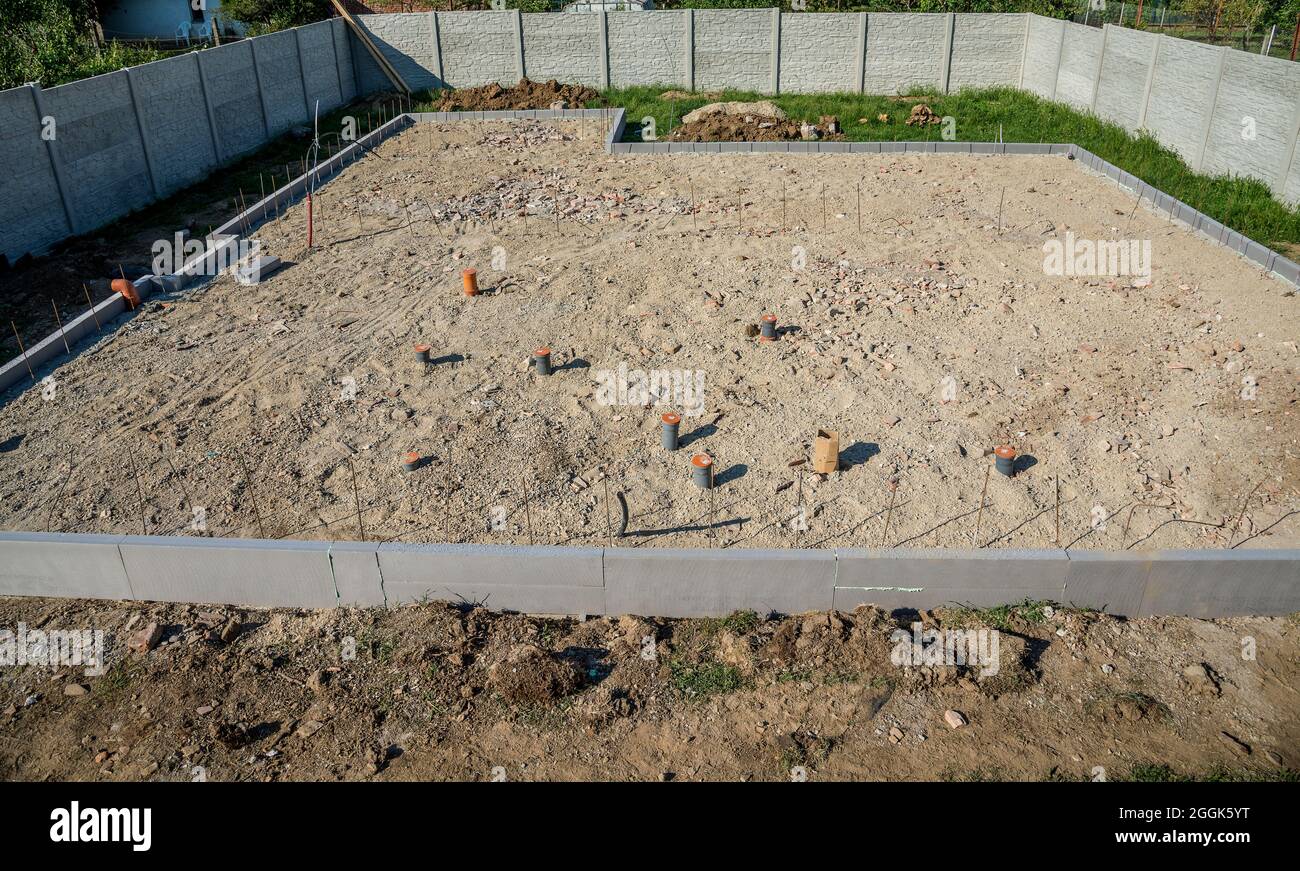 Foundation for a house with sewage pipes Stock Photo - Alamy