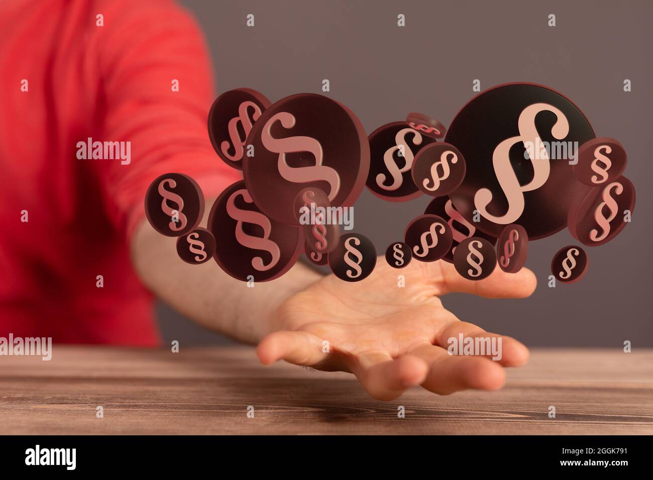 3D paragraph law and justice signs above a hand Stock Photo - Alamy