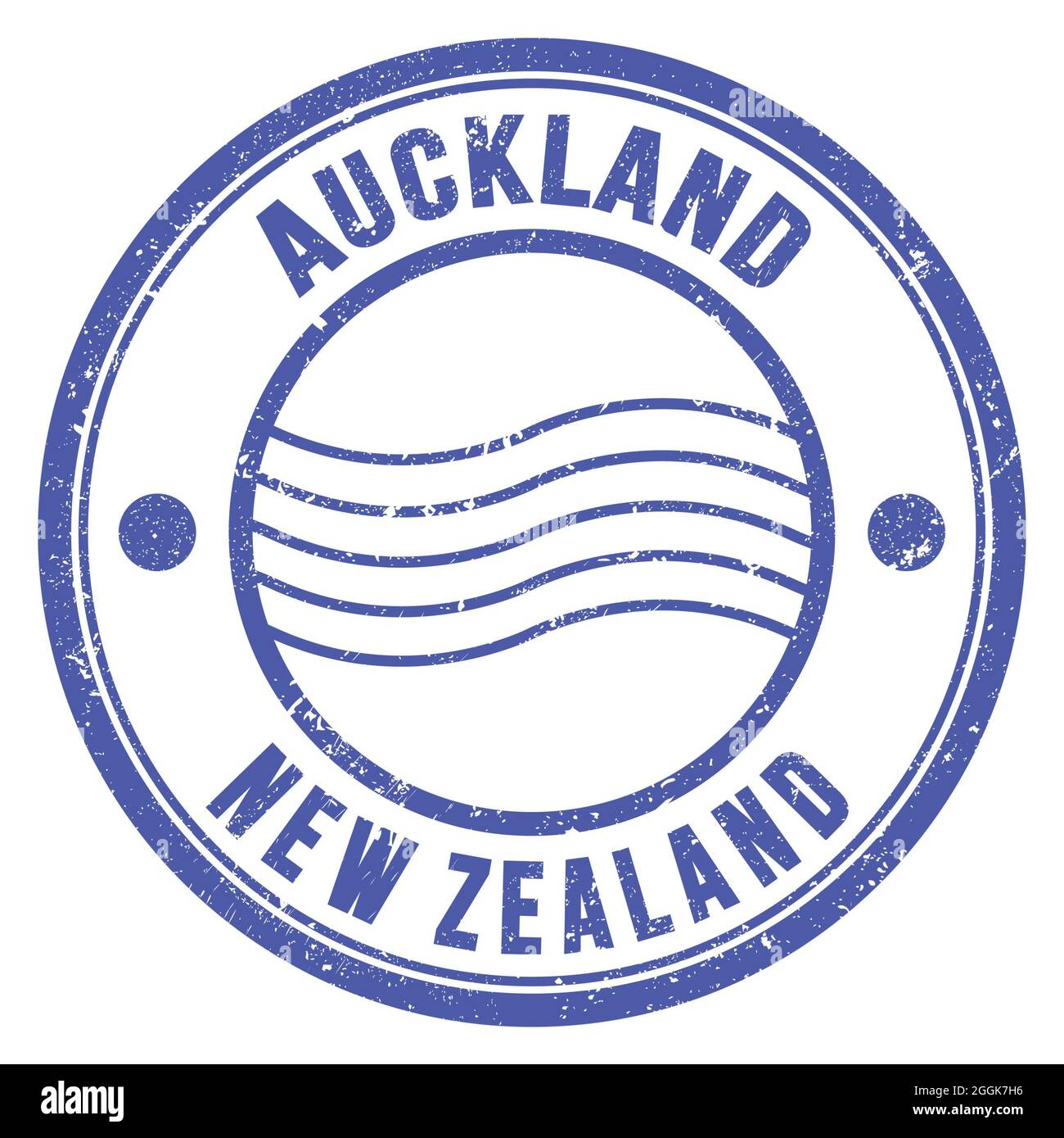 AUCKLAND - NEW ZEALAND, words written on light blue round postal stamp ...
