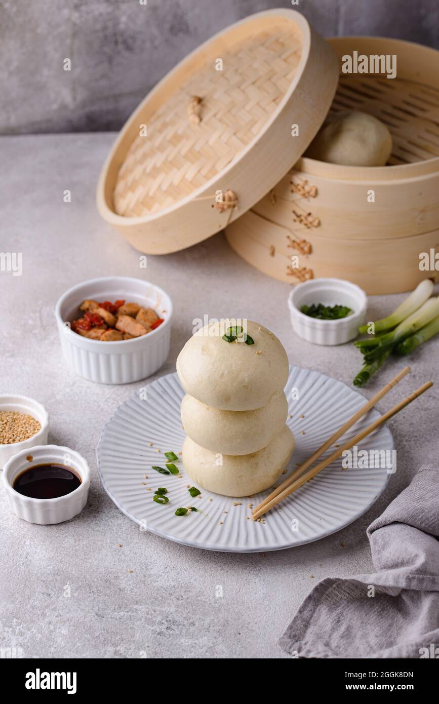 Chinese steamed buns baozi with steamer Stock Photo - Alamy