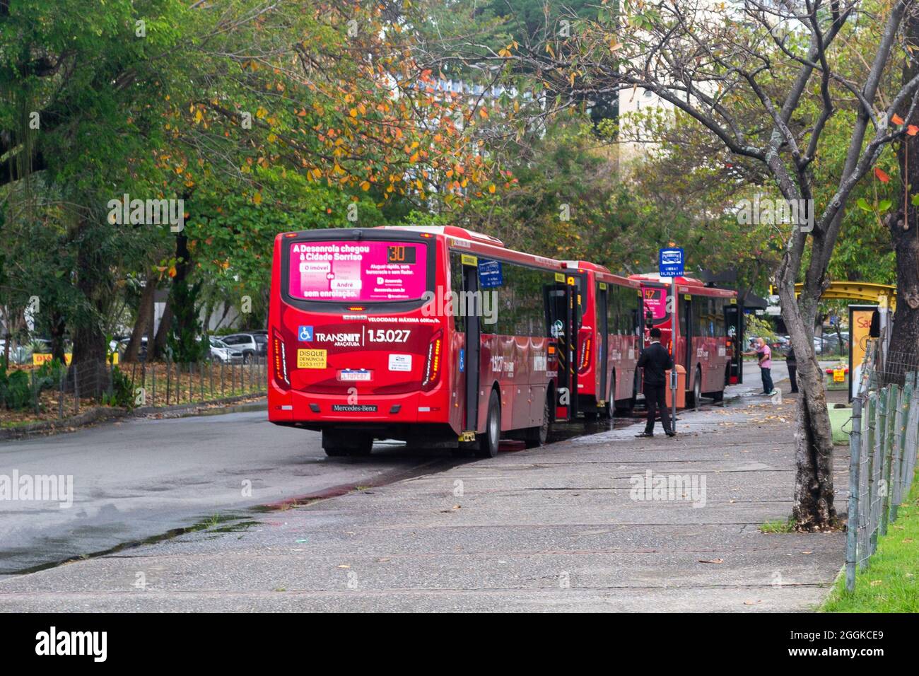 Public transportation bus picking up people on a bus stop in Niteroi ...