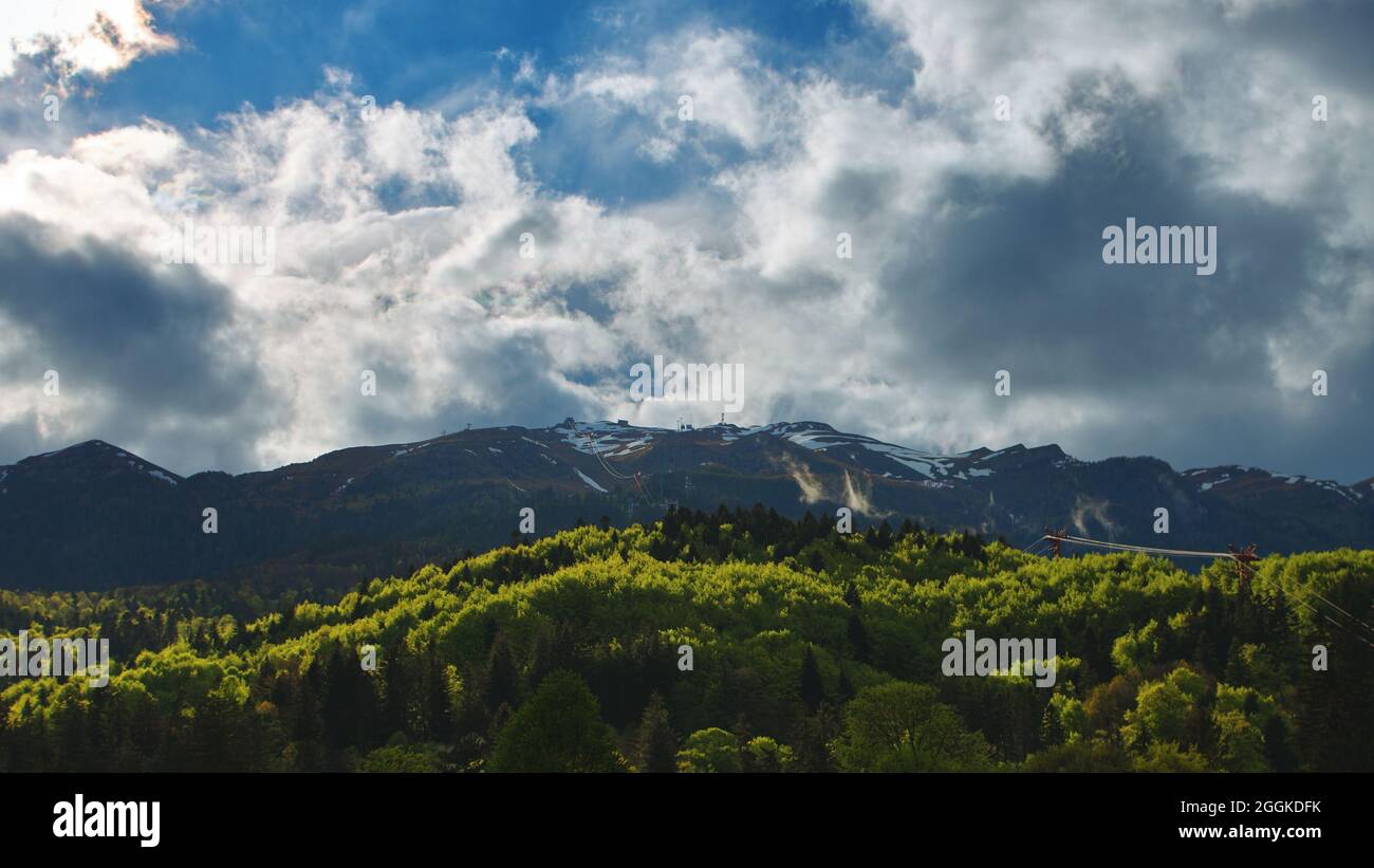 Mountain landscape with clouds and a gondola line Stock Photo - Alamy