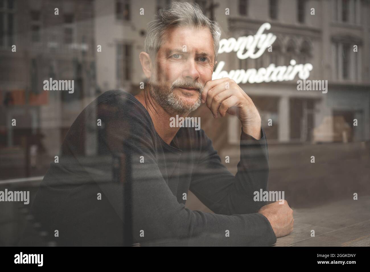 Male portrait behind glass Stock Photo - Alamy