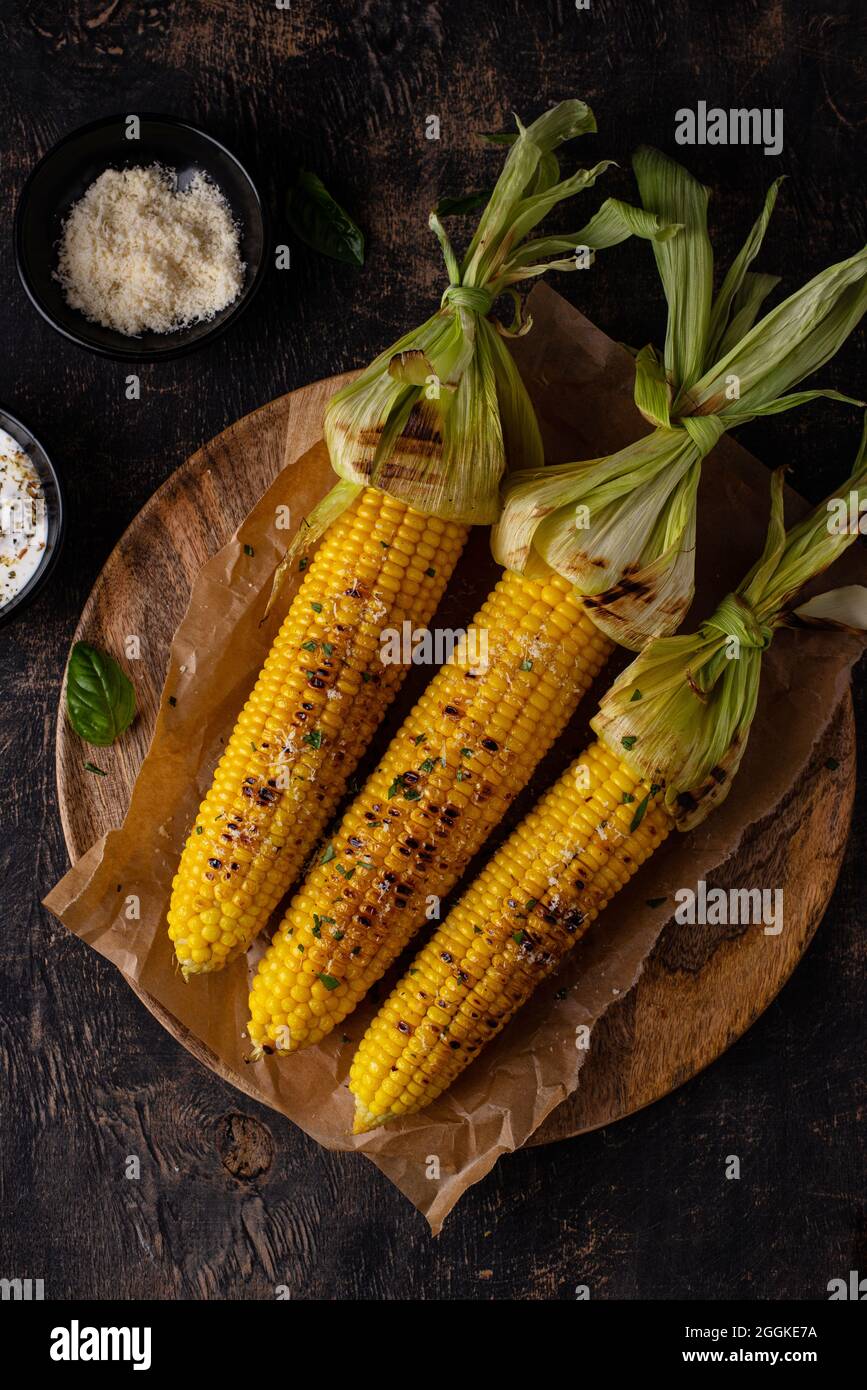Grilled corn cobs with parmesan cheese Stock Photo - Alamy