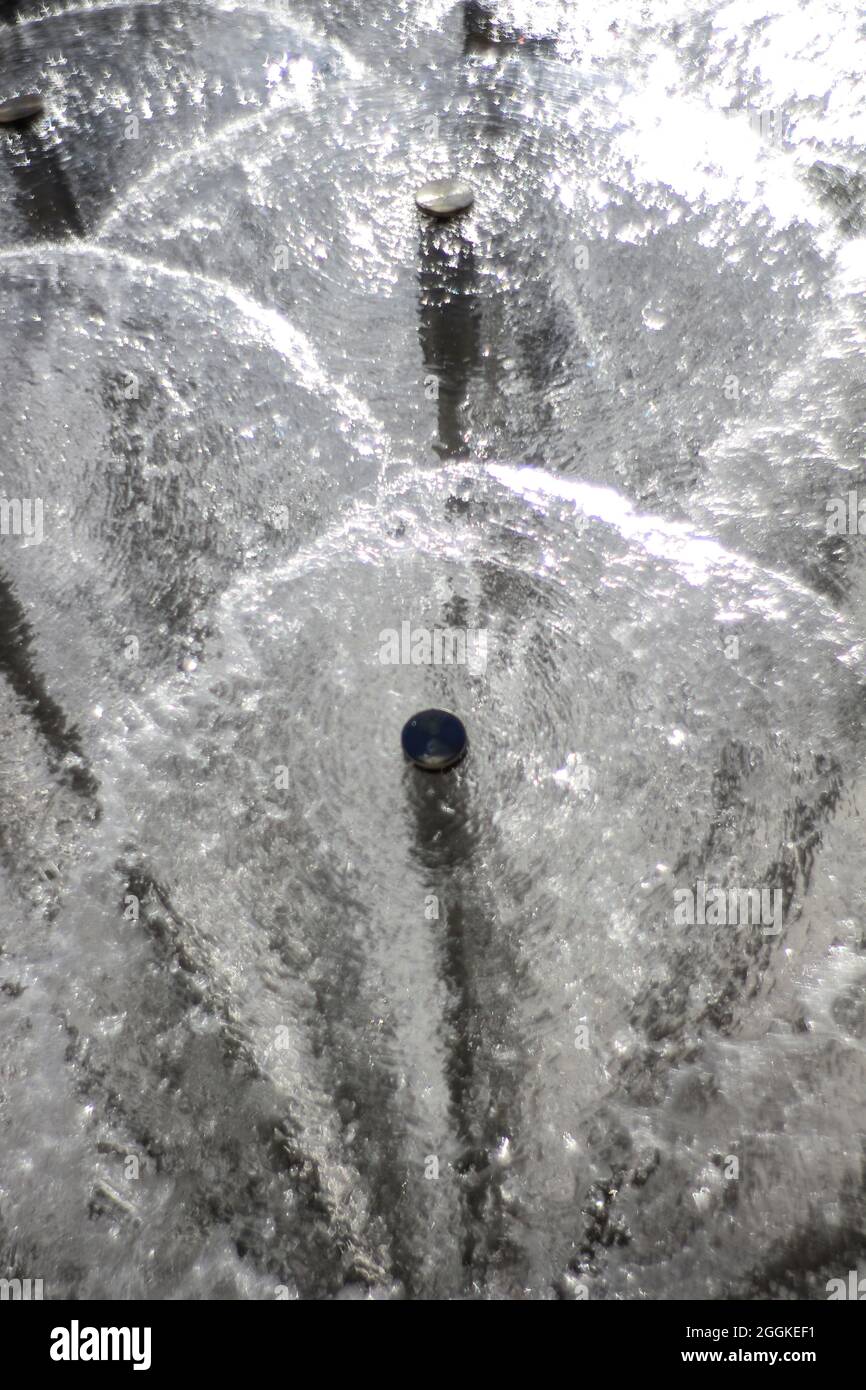 Water features of a fountain in the city Stock Photo - Alamy