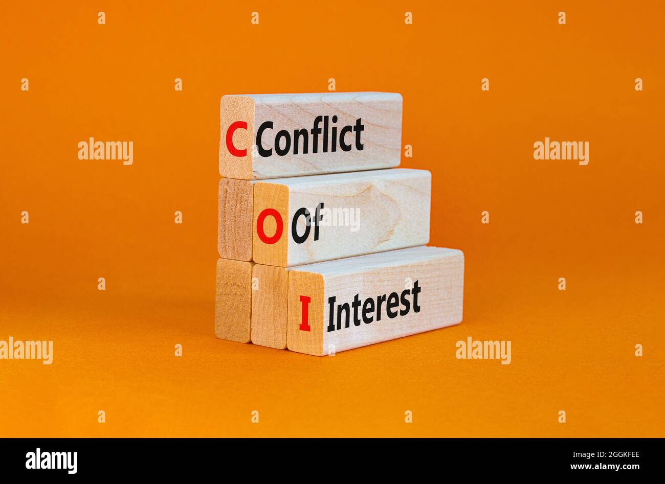 COI, Conflict of interest symbol. Wooden blocks with concept words 'COI ...
