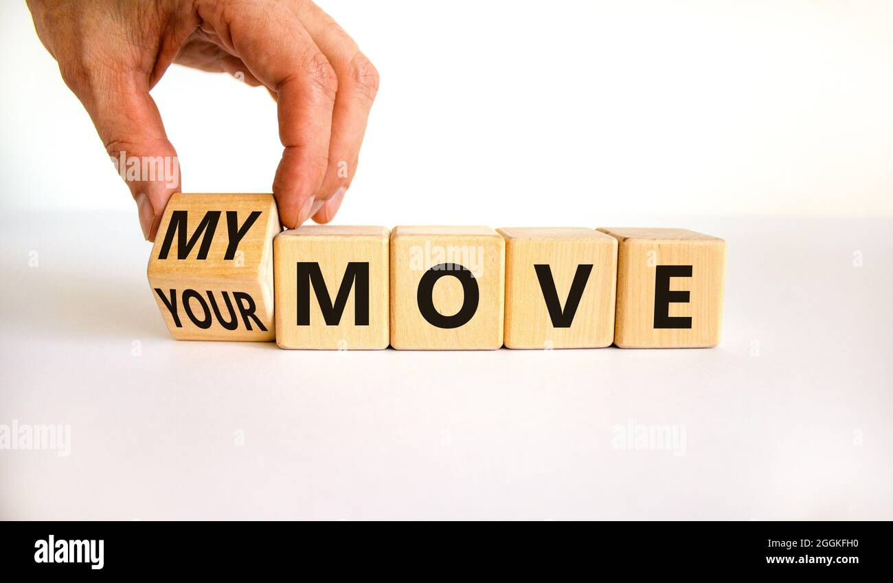 My or your move symbol. Businessman turns a wooden cube and changes ...