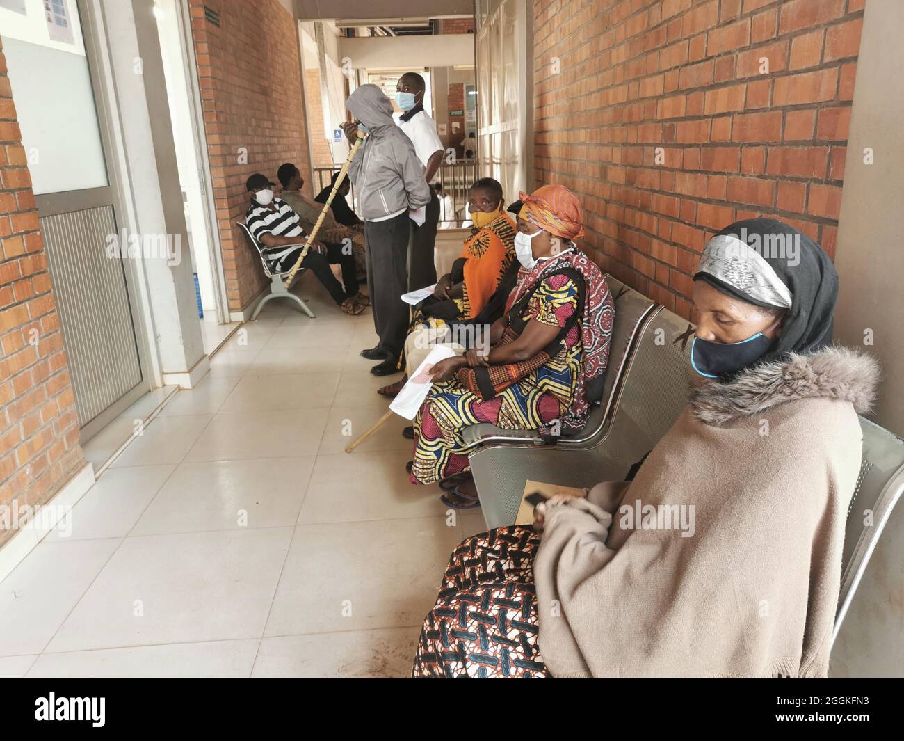 Kigali, Rwanda. 31st Aug, 2021. Patients wait outside consulting rooms ...