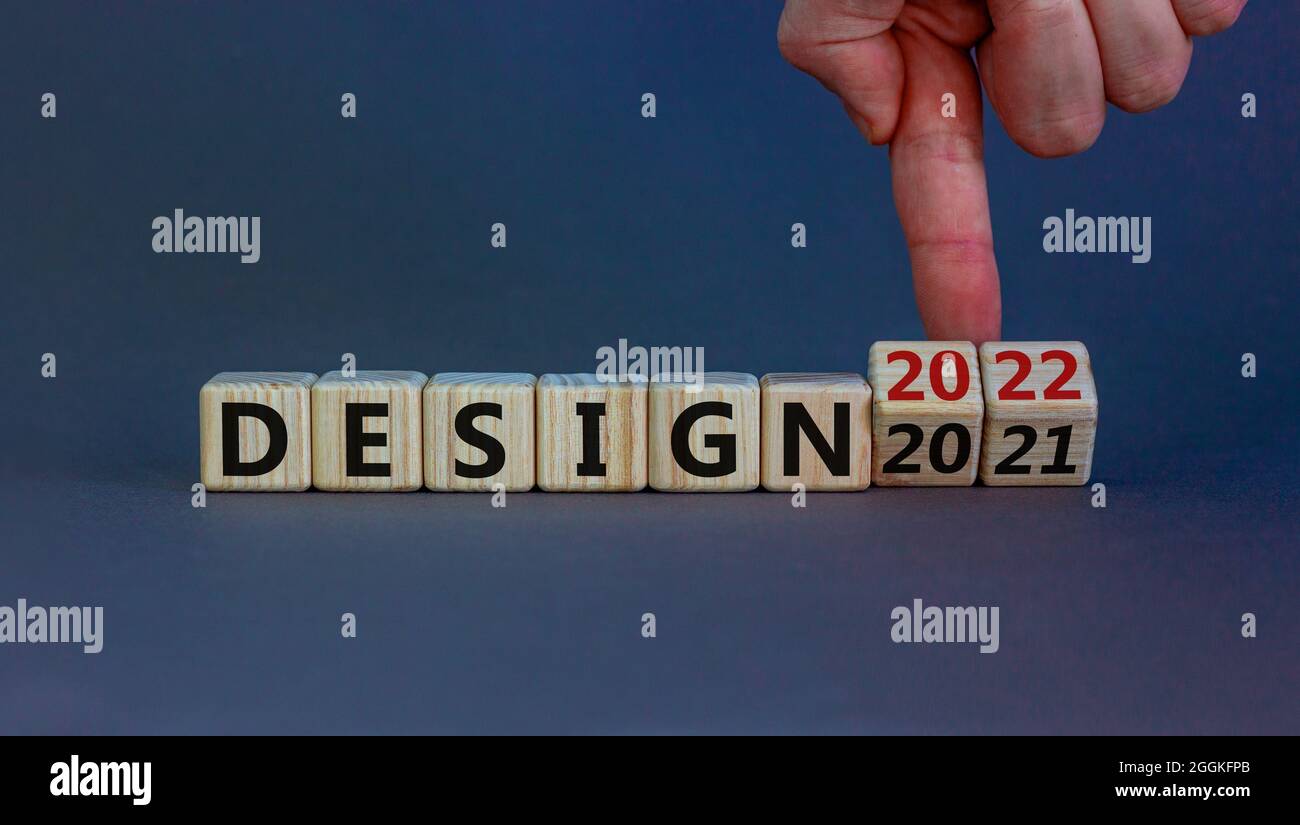 Planning 2022 design new year symbol. Businessman turns wooden cubes ...