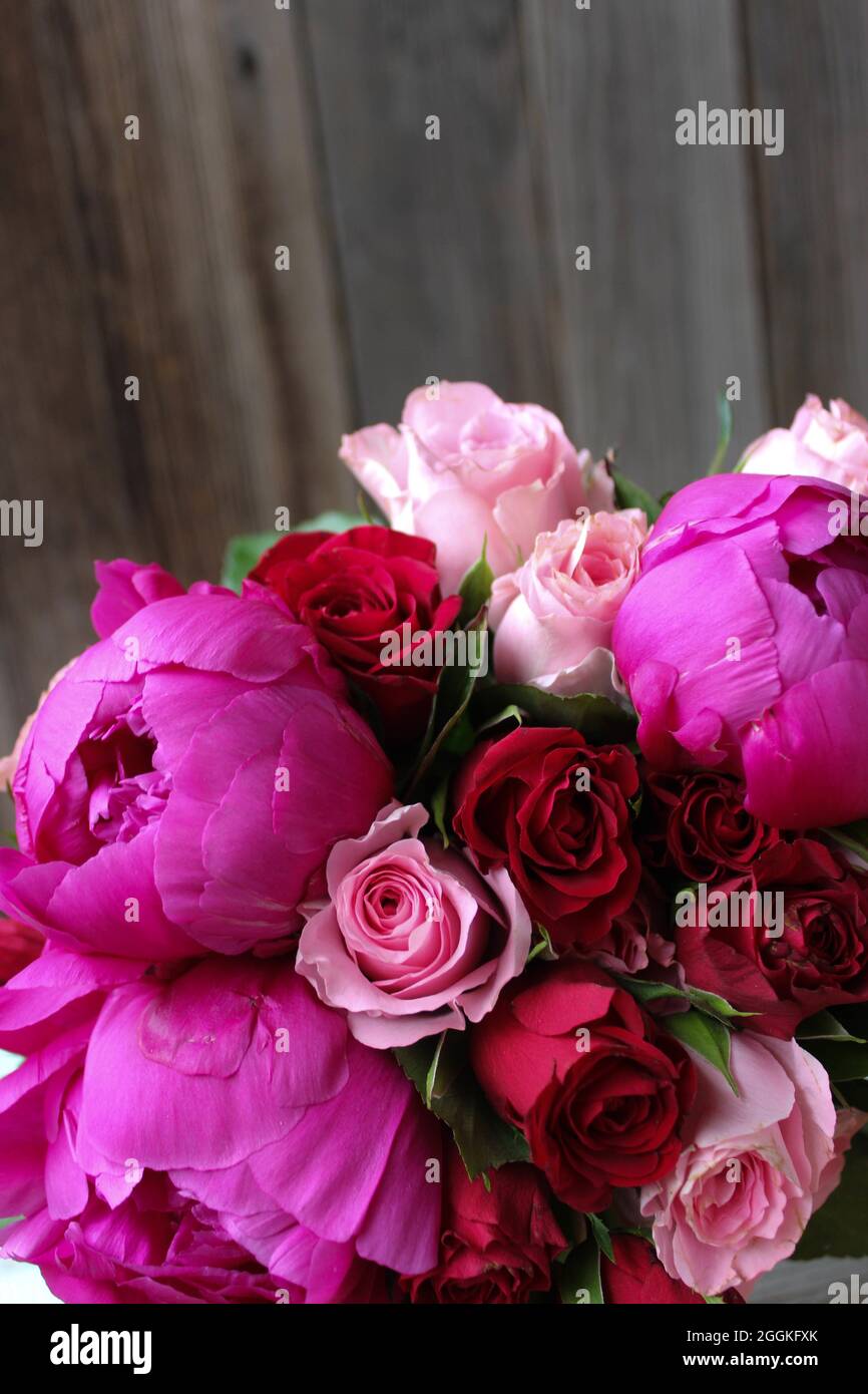 Bouquet of roses and peonies Stock Photo - Alamy