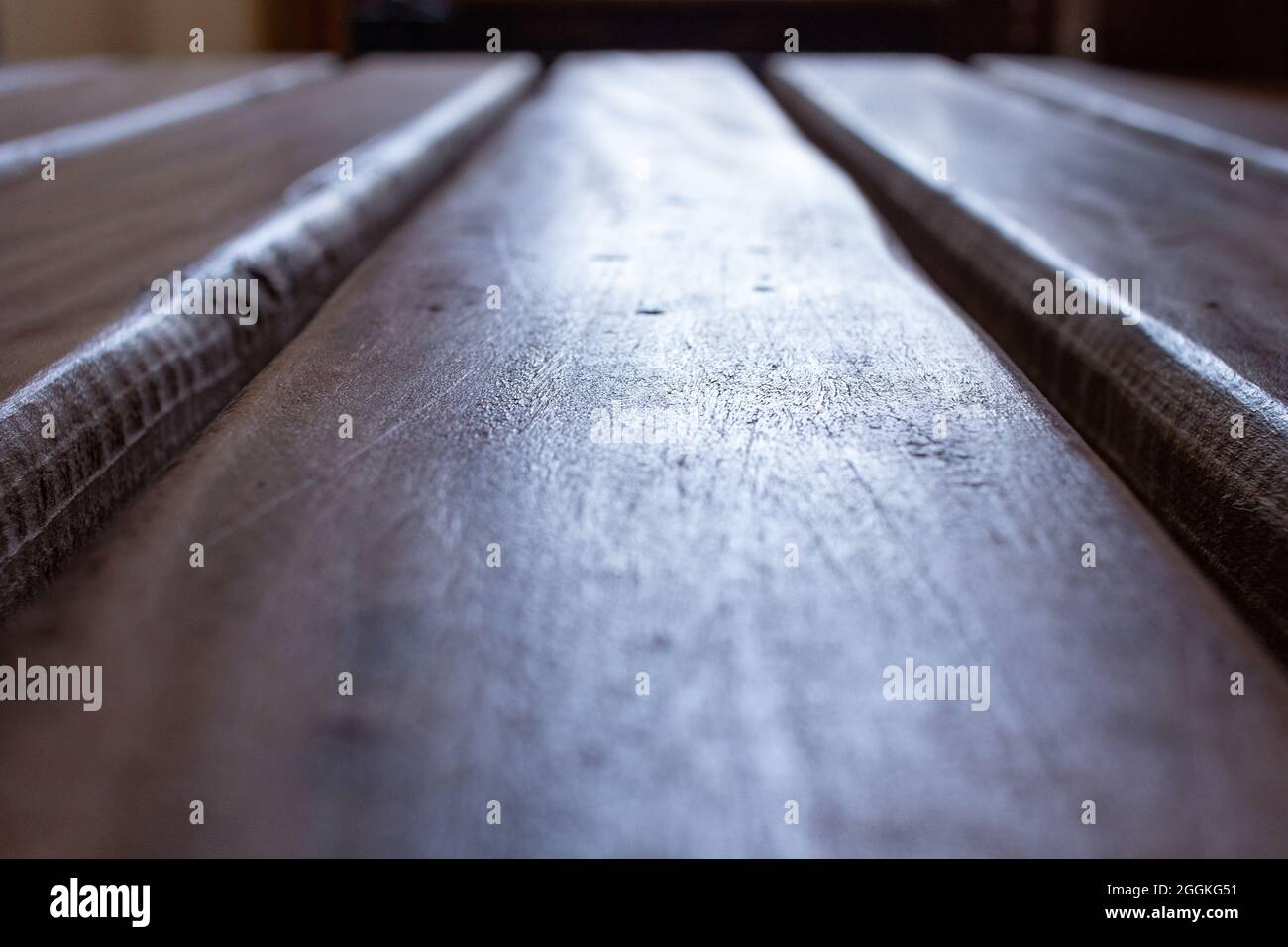 Dark colored wood texture, with selective focus on the central part ...