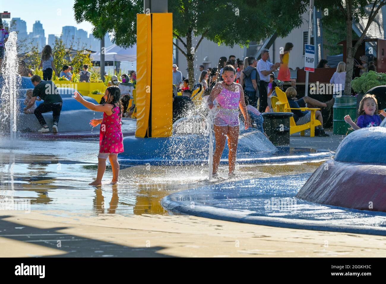 Kids at water playground, Shipyards, North Vancouver, British Columbia ...