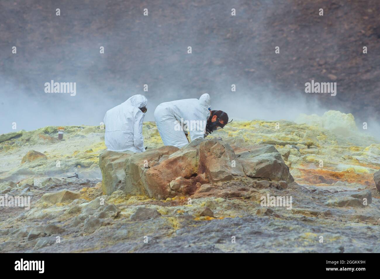 Volcanologists collecting minerals samples on Gran Cratere, Vulcano ...