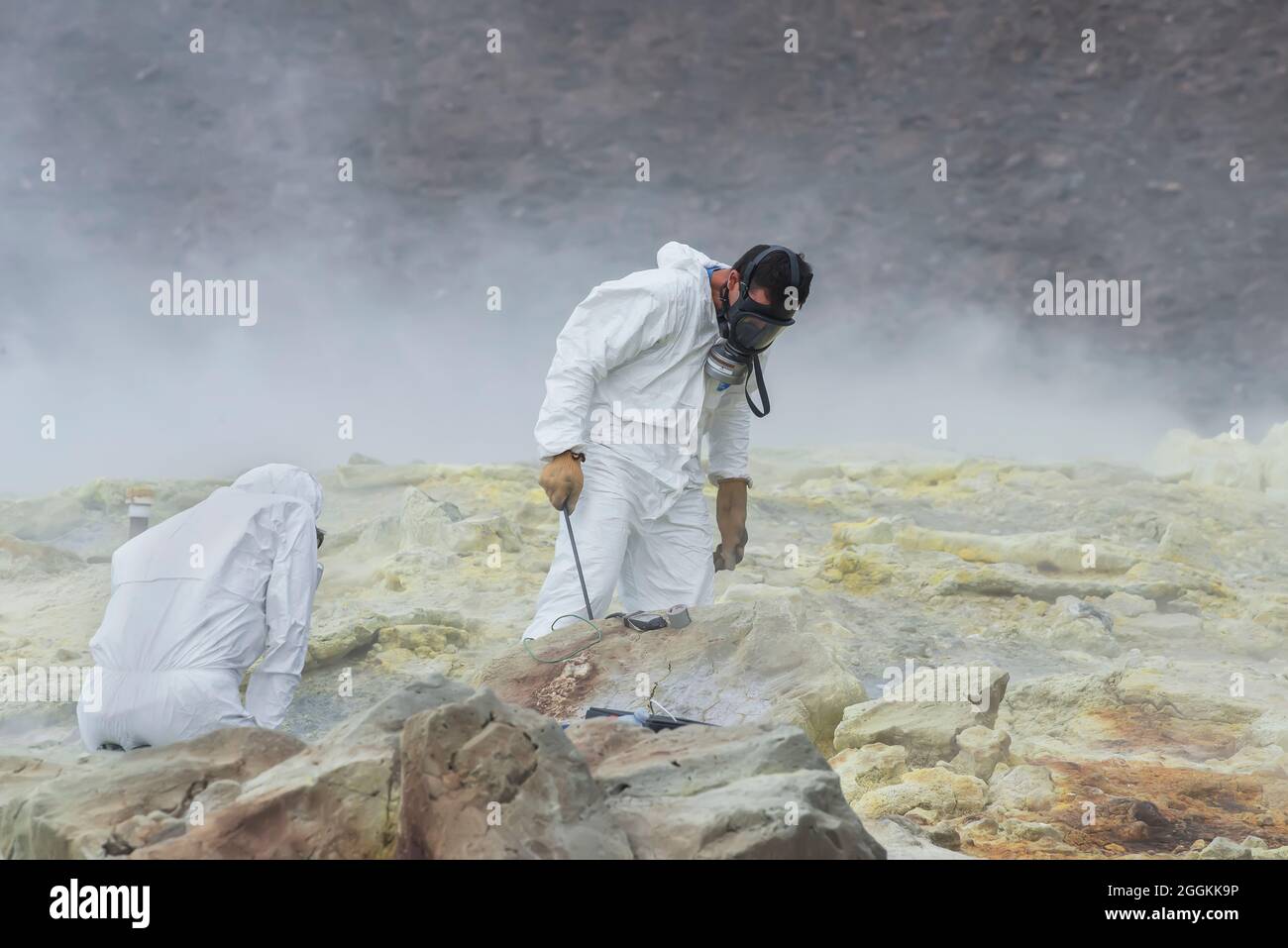 Volcanologists collecting minerals samples on Gran Cratere, Vulcano ...