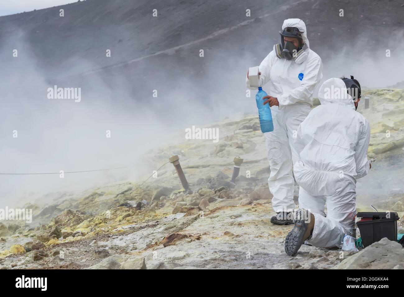 Volcanologists collecting minerals samples on Gran Cratere, Vulcano ...