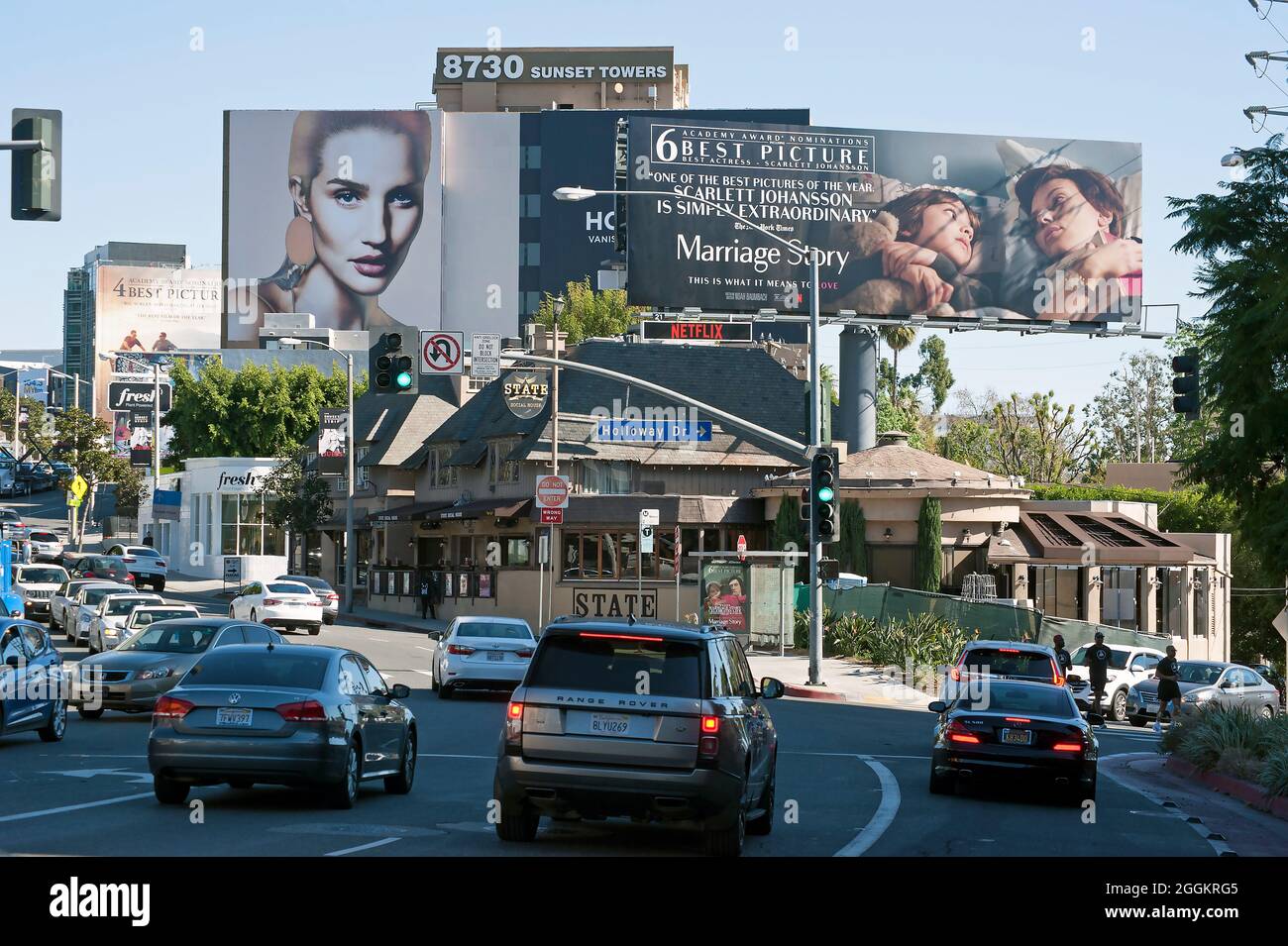 View of the Sunset Strip with cars and billboards in West Hollywood, CA ...