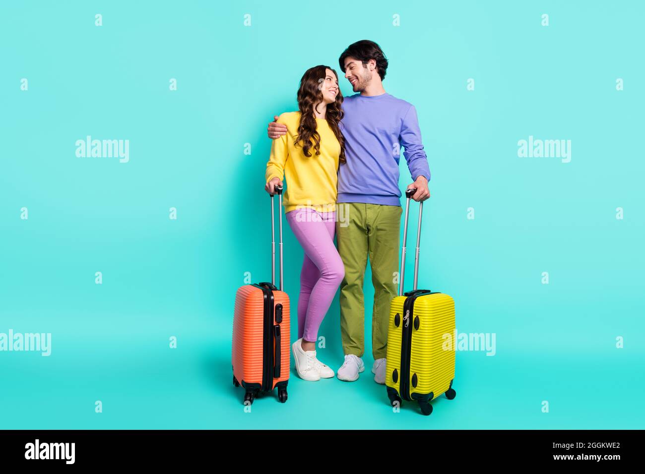 Full body photo of young couple happy positive smile hug travel fly ...