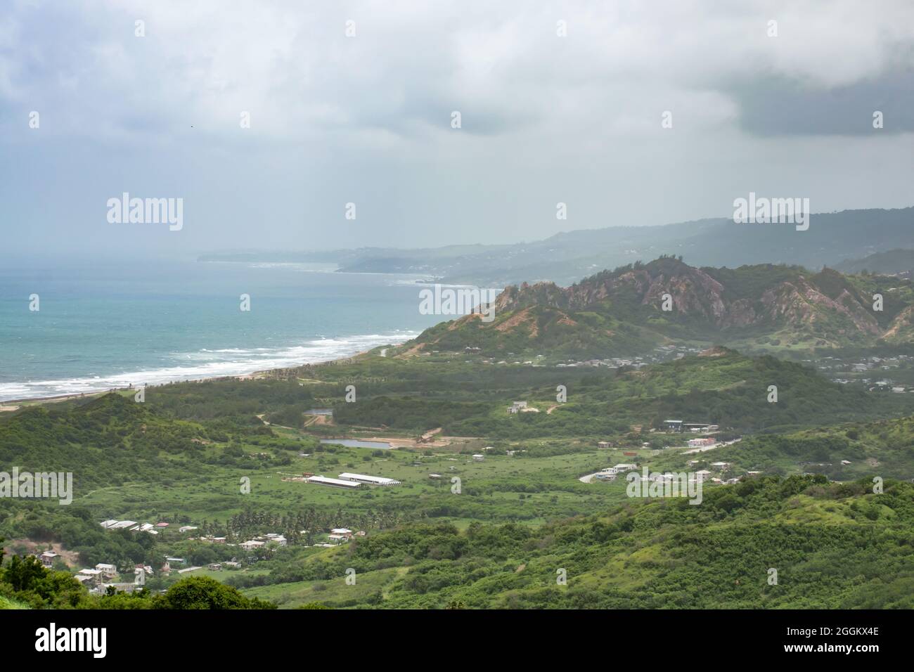 A view from Cherry Tree Hill in Barbados. Trees, hills and the coast ...