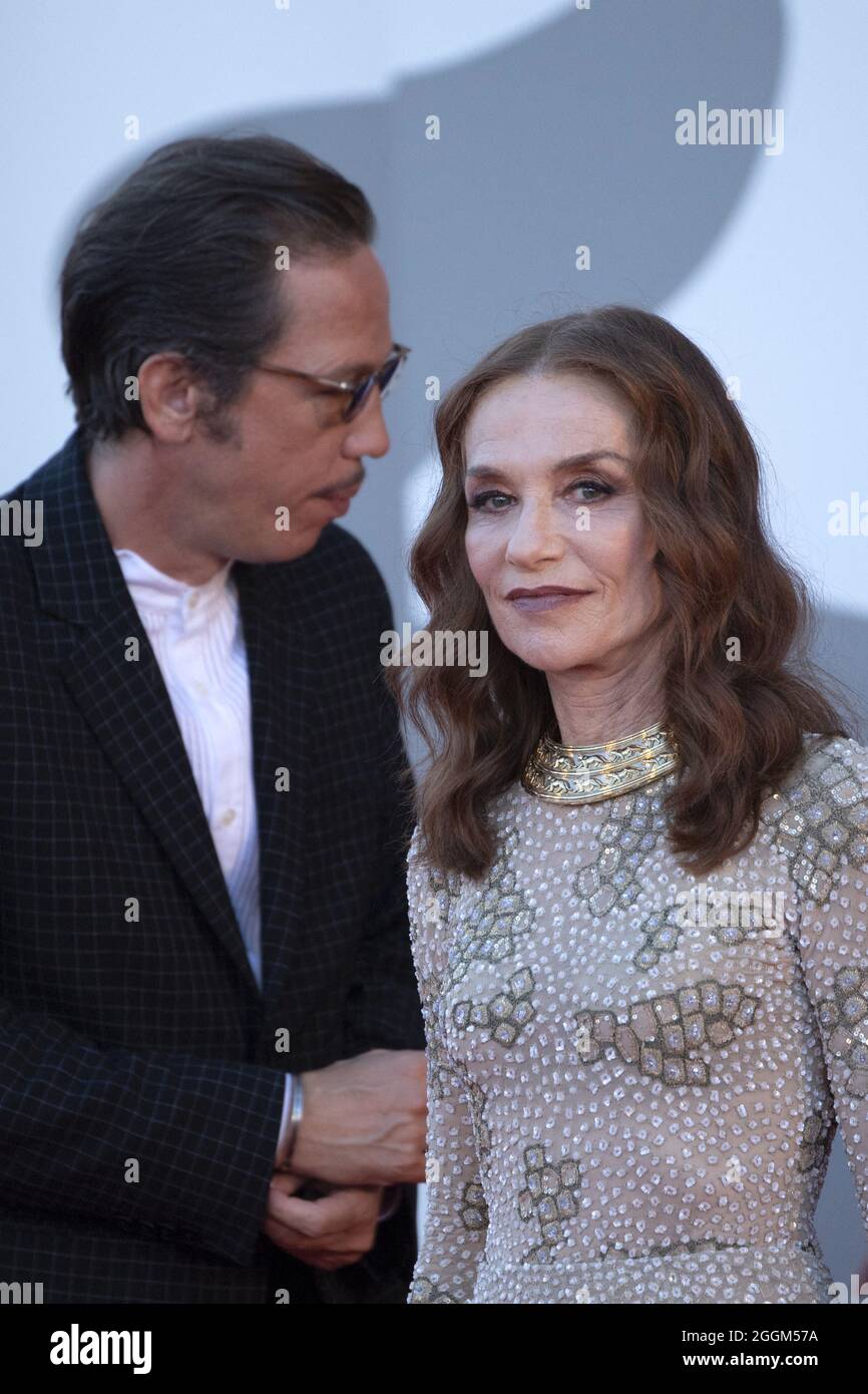 Reda Kateb and Isabelle Huppert attending the Madres Paralelas Premiere ...