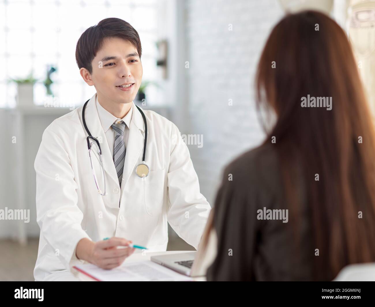 Young asian doctor woman talking hi-res stock photography and images ...