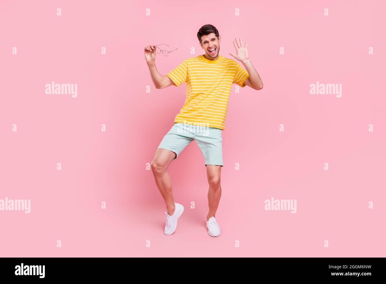 Full body photo of cheerful young happy man dance good funky mood ...