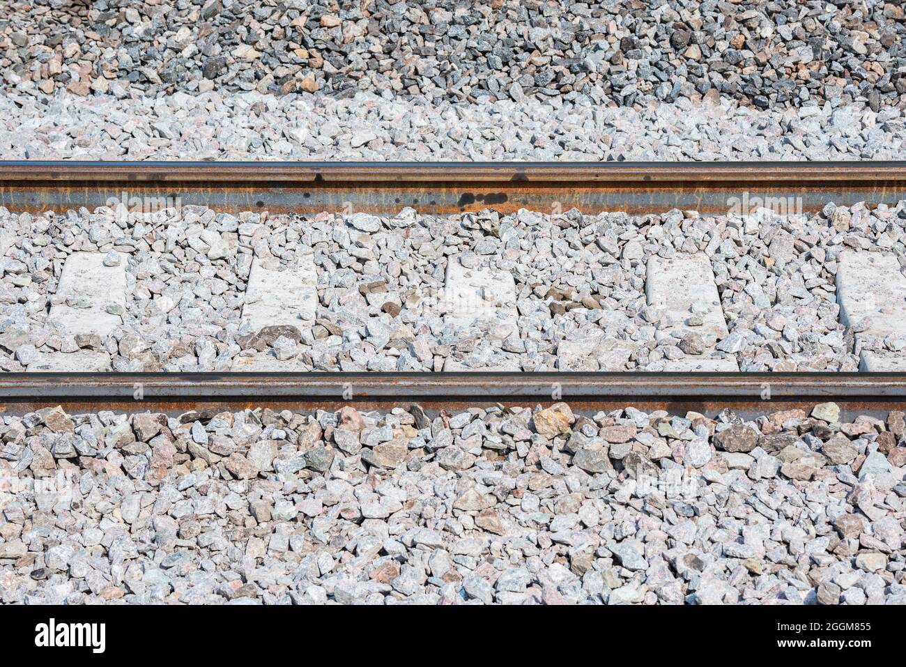 Railway track on the big station at day time Stock Photo - Alamy