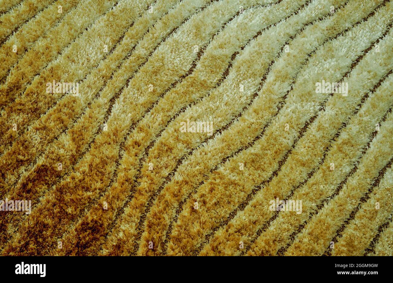 rug or carpet in cream and gold colours Stock Photo - Alamy