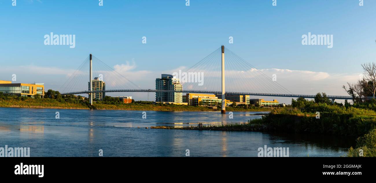 Bob Kerrey Pedestrian Bridge and Riverfront Place on a beautiful ...