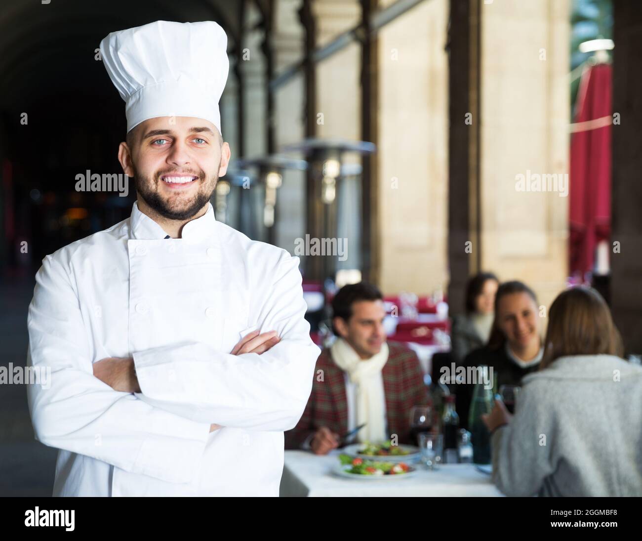 Chef meeting restaurant guests Stock Photo - Alamy