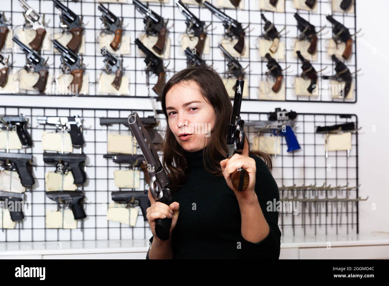 Young Woman Aiming Revolver High Resolution Stock Photography and ...