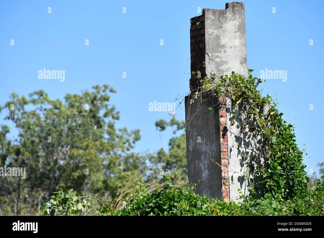 Old stone chimney relic from the historical mining town of Burrundie ...