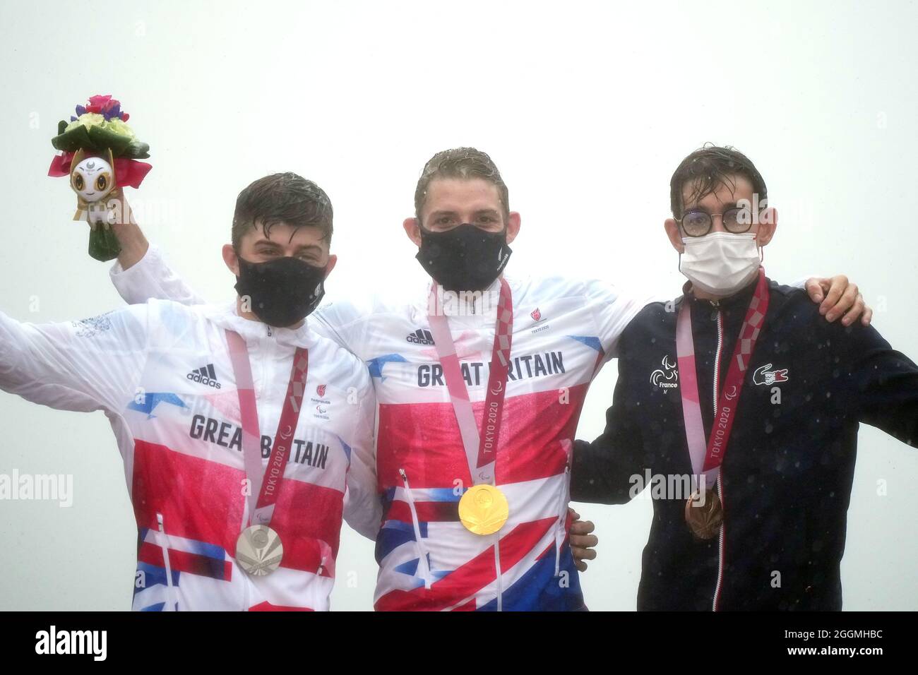 Great Britain's Ben Watson (centre) celebrates with the gold medal ...
