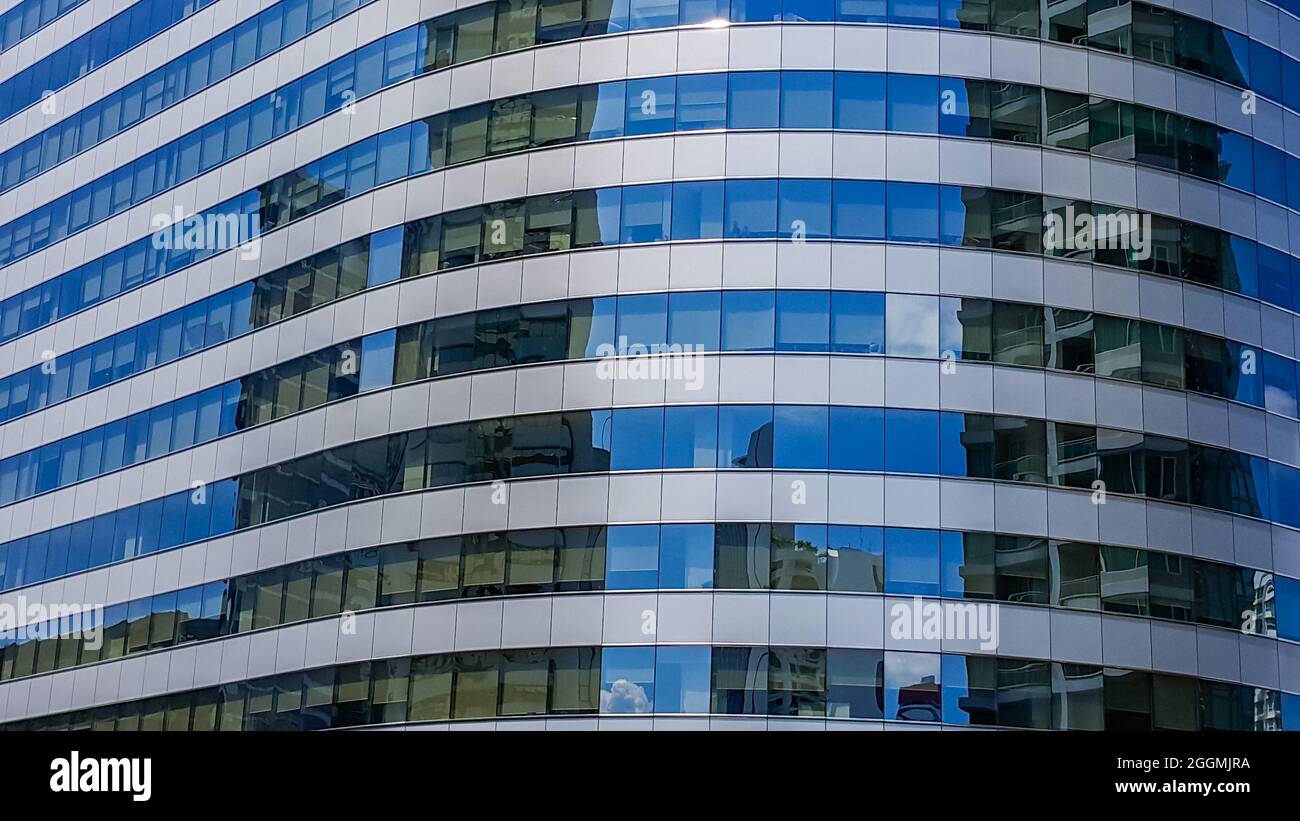 office building windows with reflection background Stock Photo - Alamy