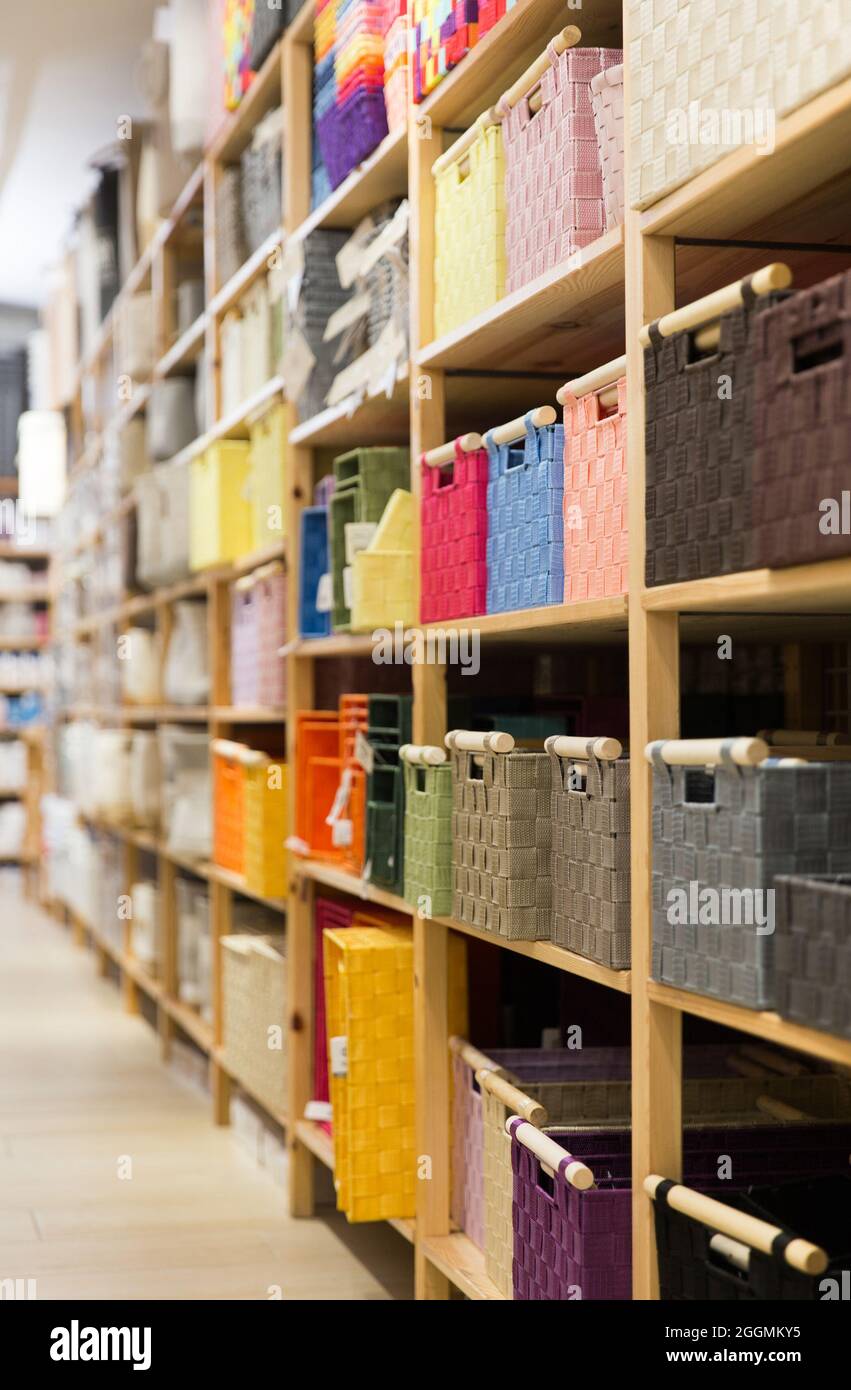 Decorative storage boxes on shelving in household goods store Stock ...