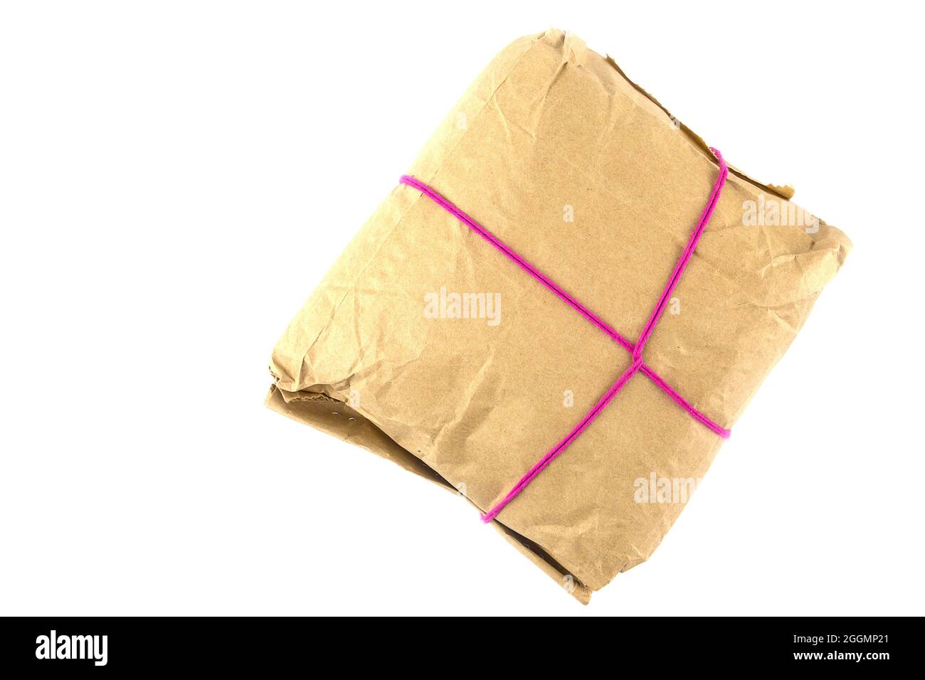 Parcel wrapped with brown paper, tied with pink string isolated on ...