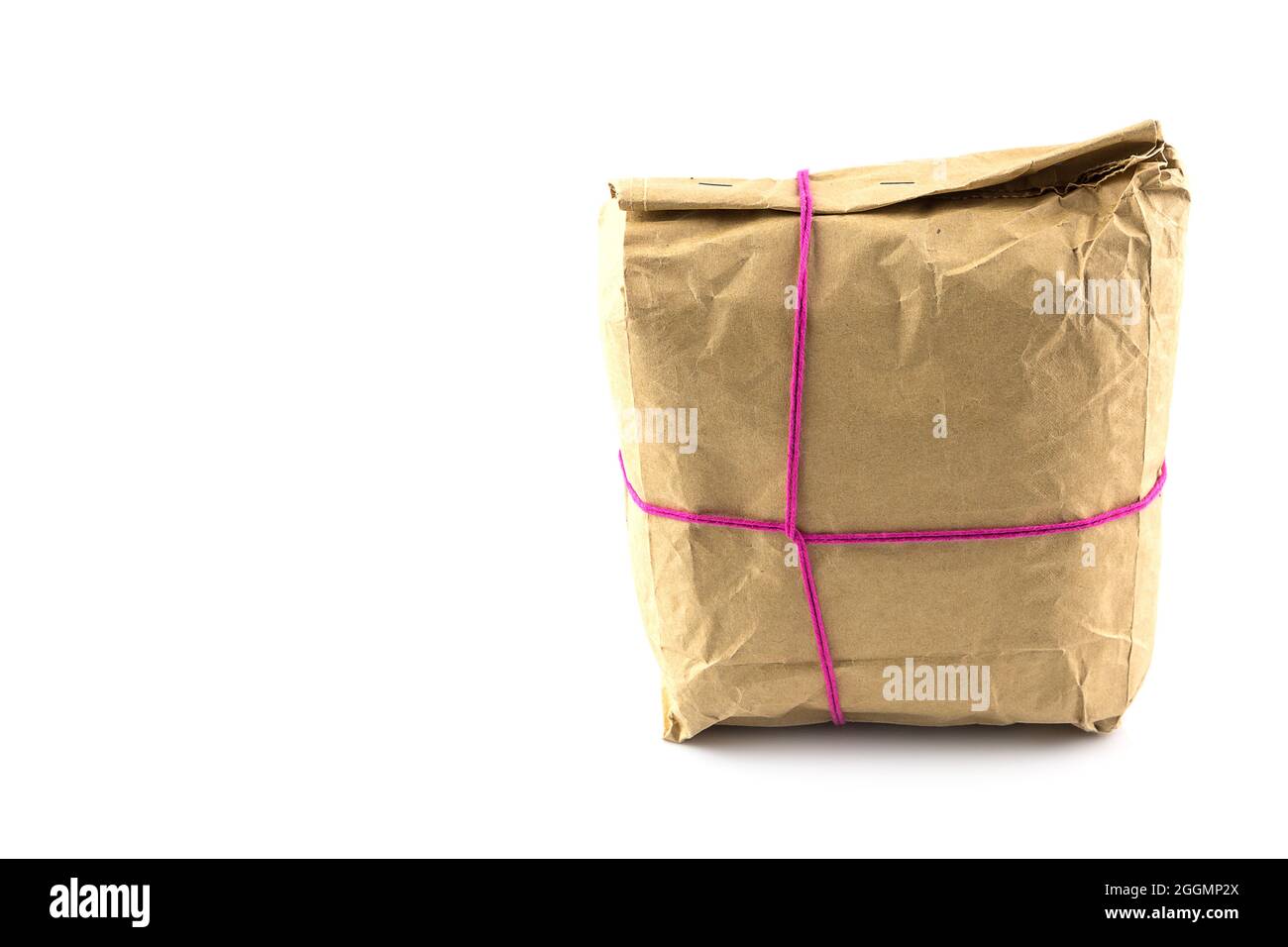 Parcel wrapped with brown paper, tied with pink string isolated on ...