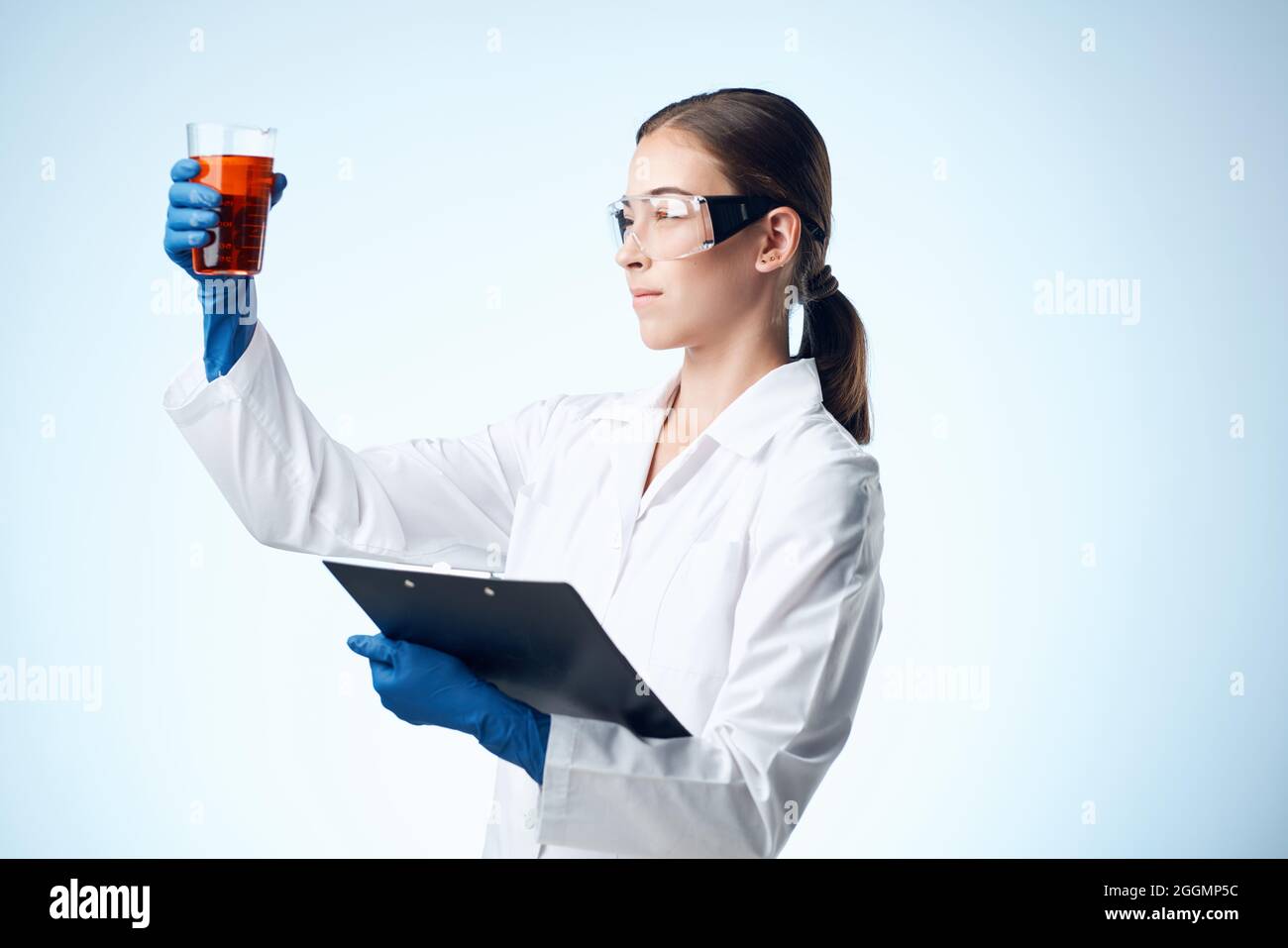 female laboratory assistant medicine research technology chemistry ...