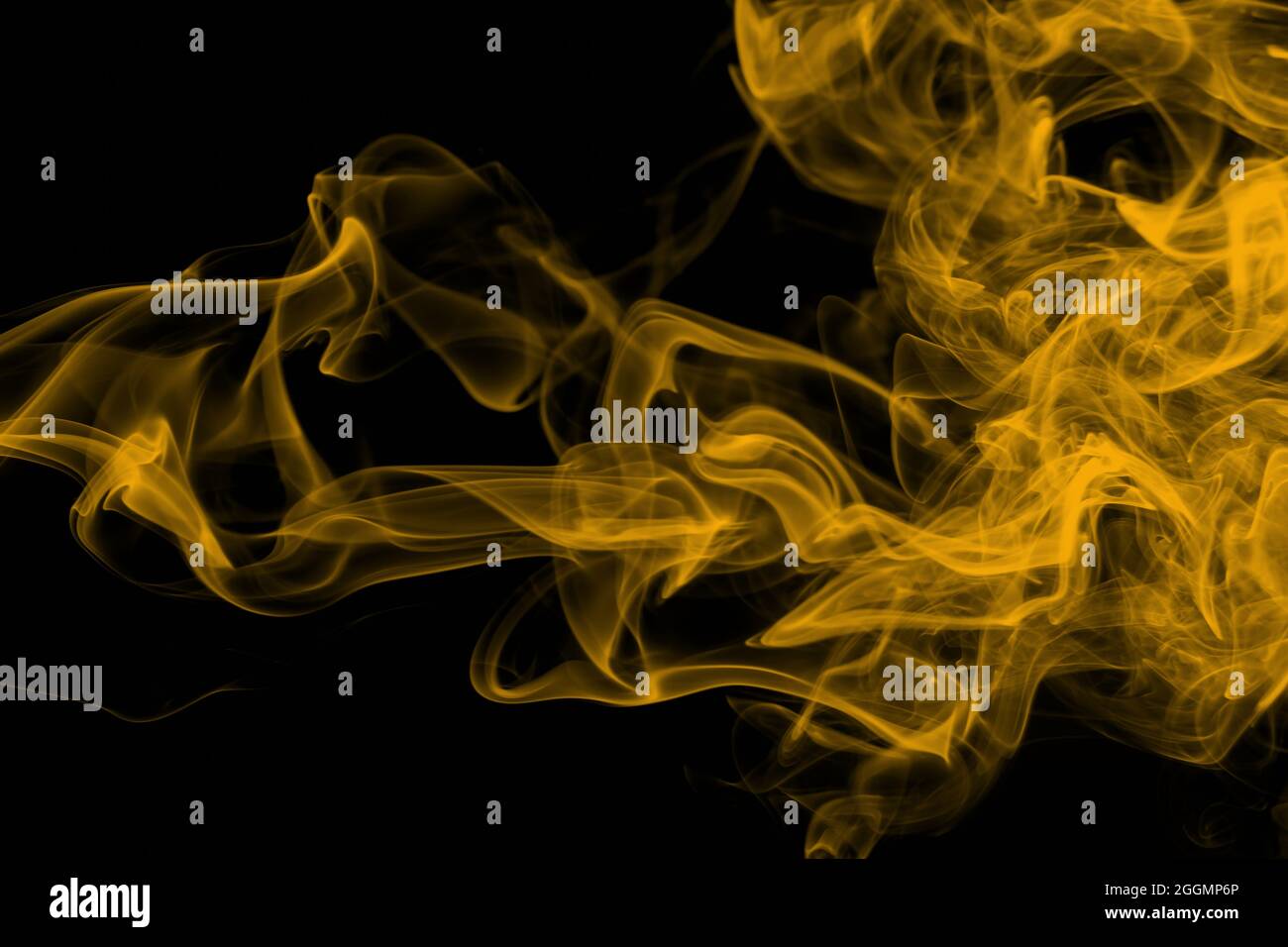 Yellow smoke abstract on black background, fire design Stock Photo - Alamy