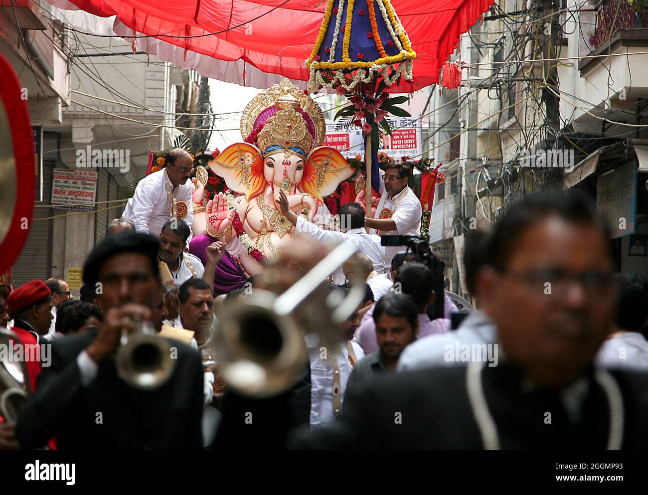 Indian hindu people take part in a religious procession on the occasion ...