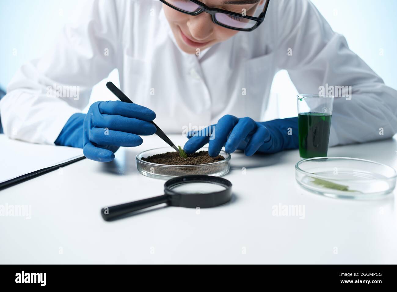 cheerful female biologist in a white coat scientist laboratory Stock ...