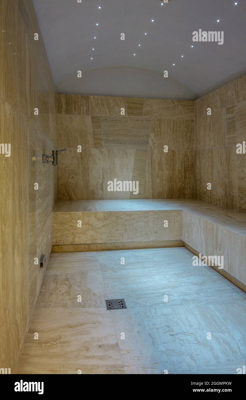 Home steam room in style of Turkish hamam with marble walls Stock Photo ...
