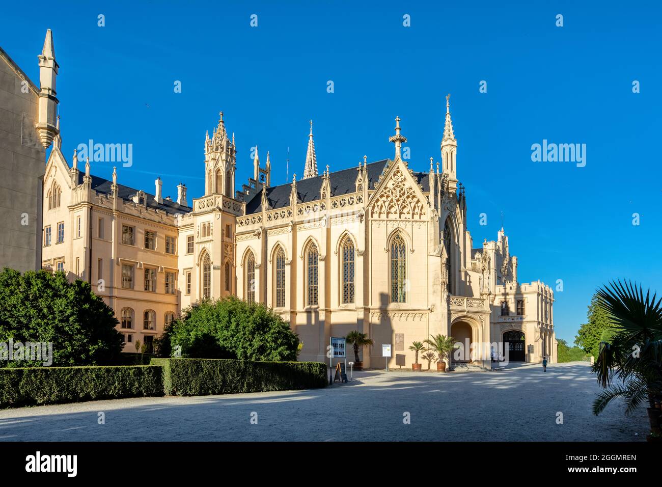 Lednice Chateau with beautiful gardens with flowers and parks on sunny ...