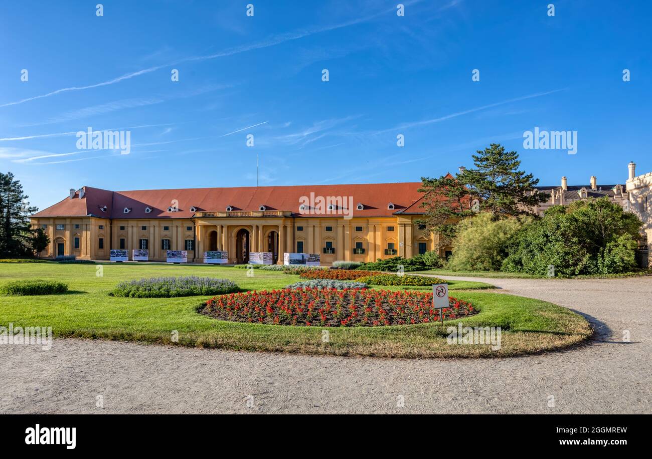 Lednice Chateau with beautiful gardens with flowers and parks on sunny ...