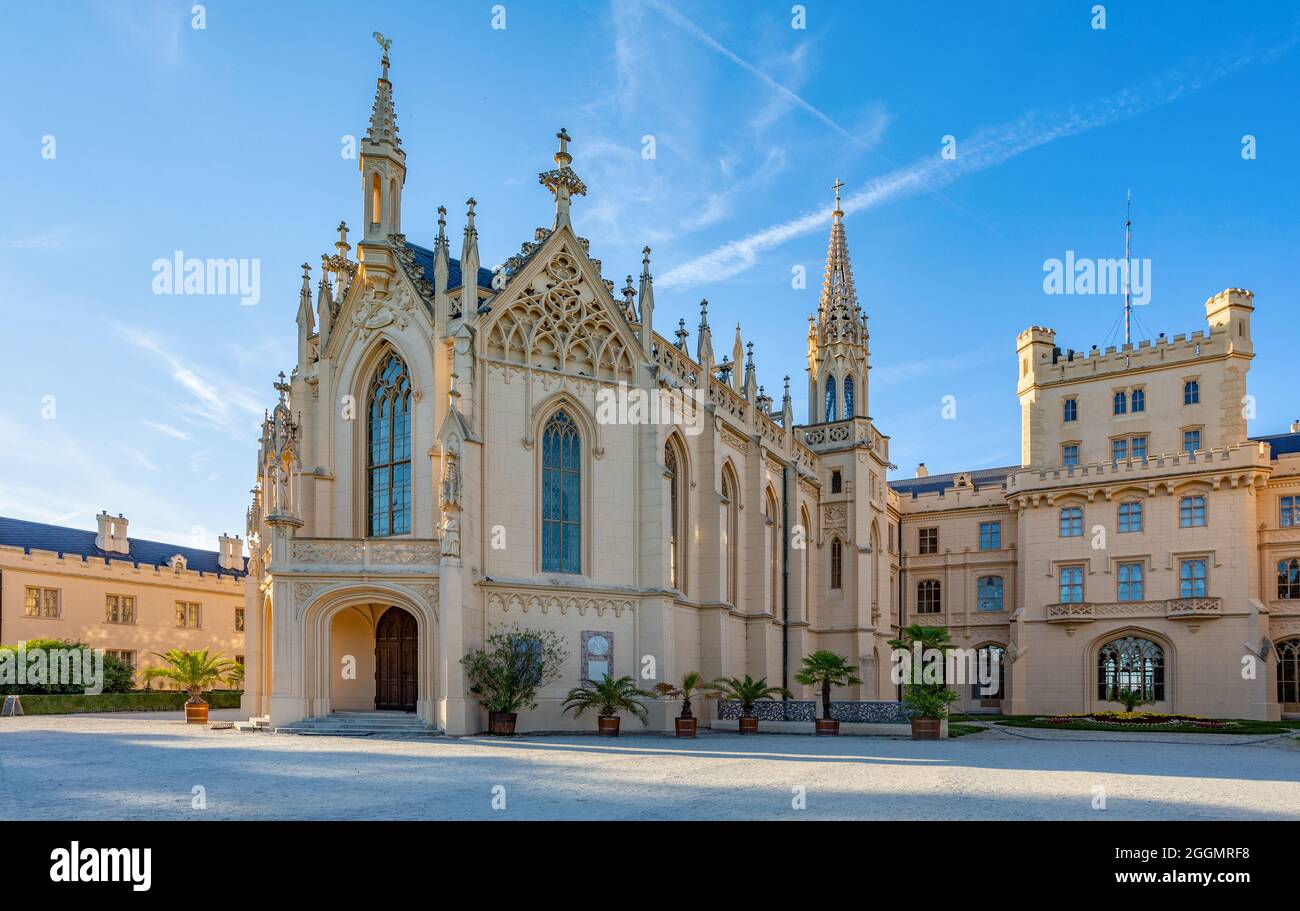 Lednice Chateau with beautiful gardens with flowers and parks on sunny ...