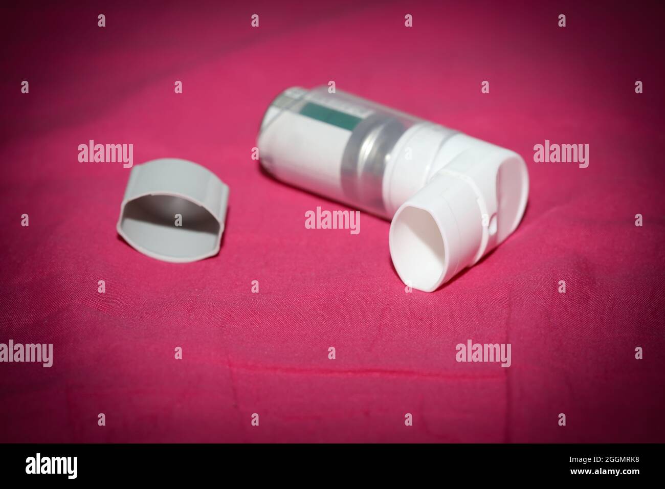 White asthma inhaler close up Stock Photo - Alamy