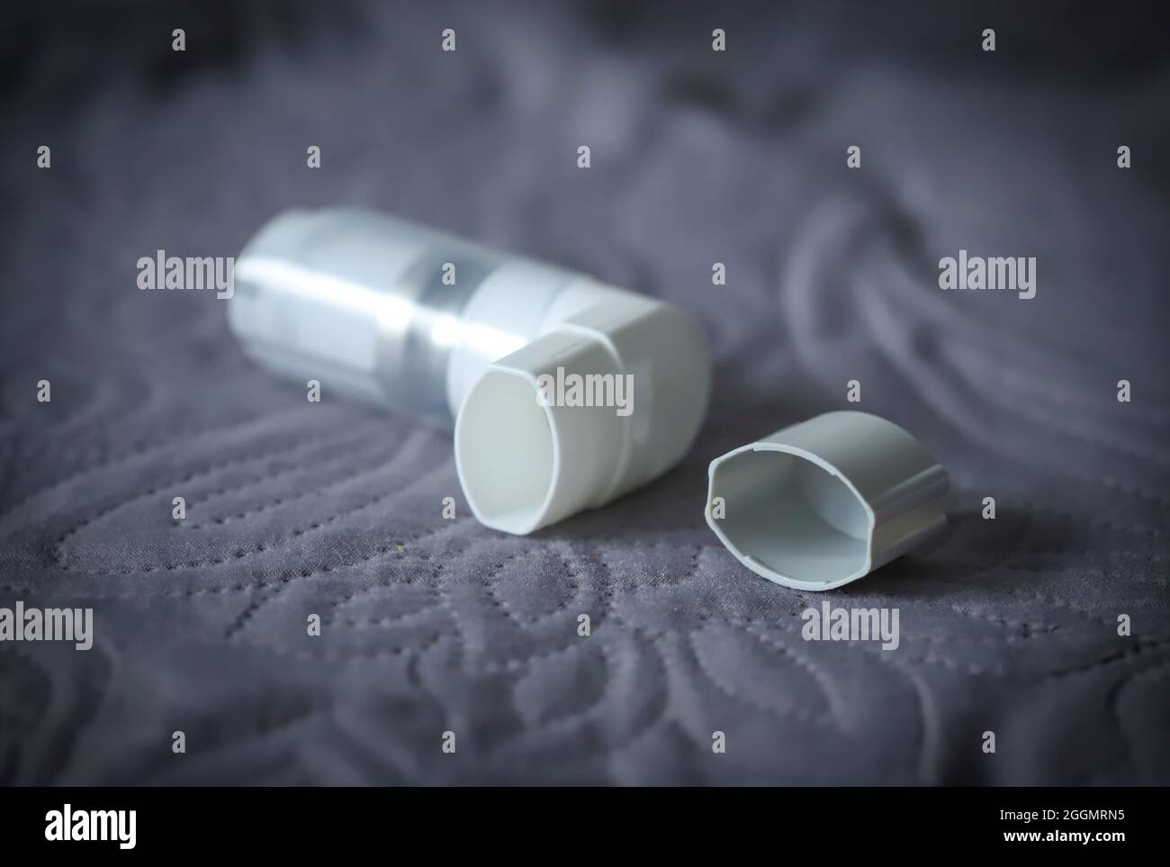White asthma inhaler close up Stock Photo - Alamy